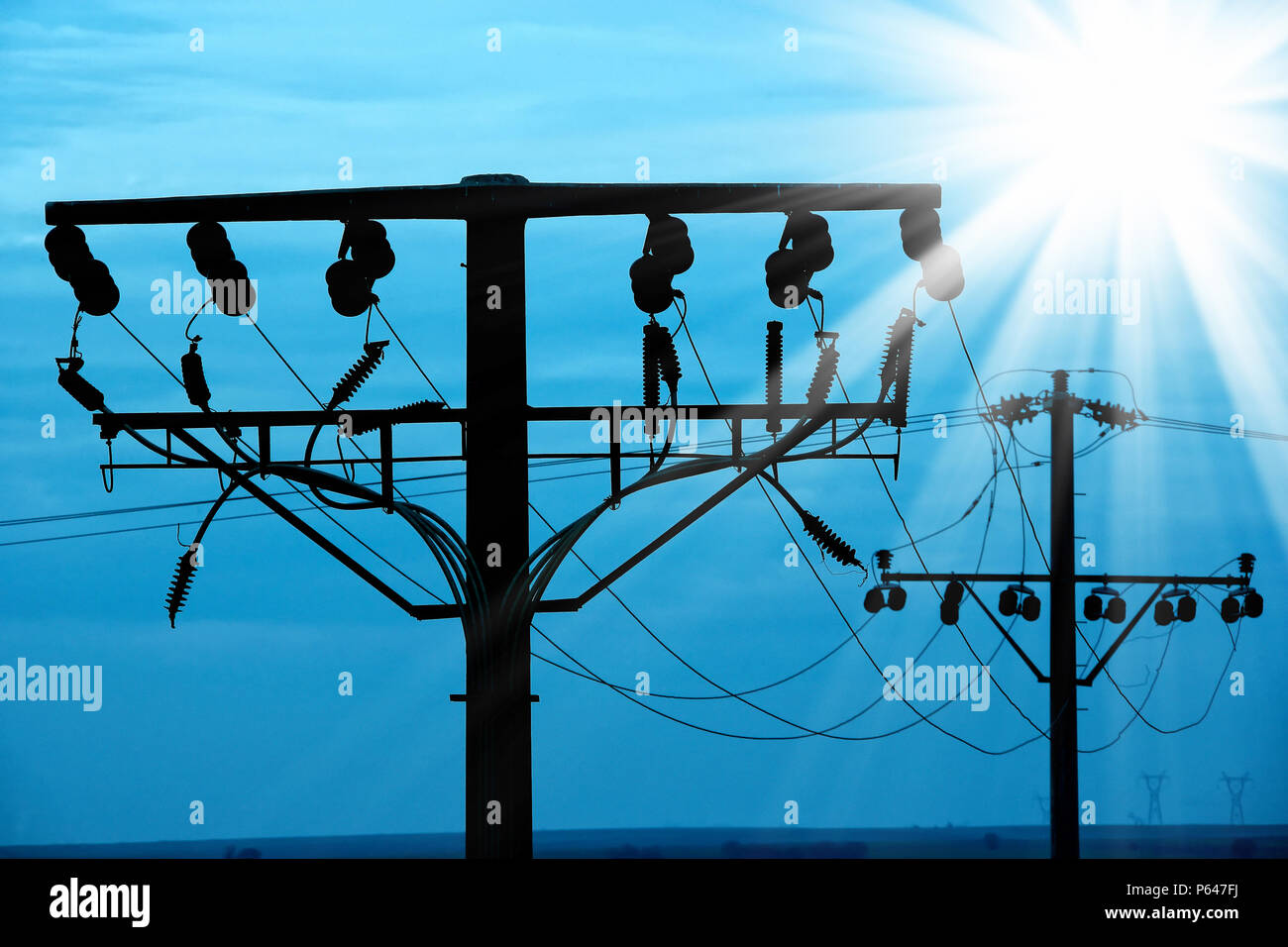 an image of a metal tower of Power Lines Stock Photo - Alamy