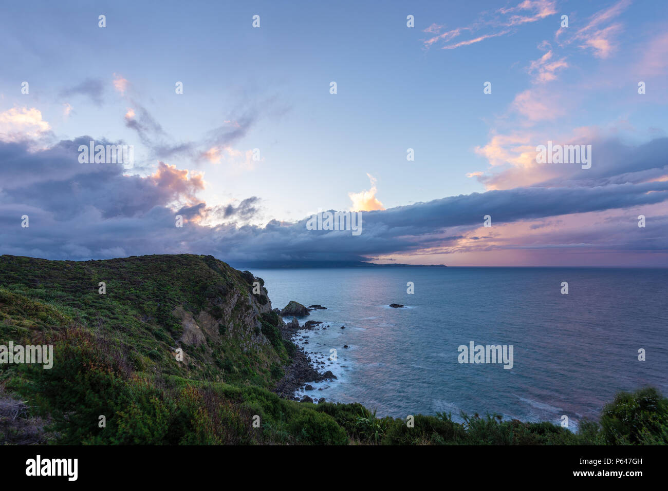 Takatu Point Tawharanui New Zealand at sunset Stock Photo - Alamy