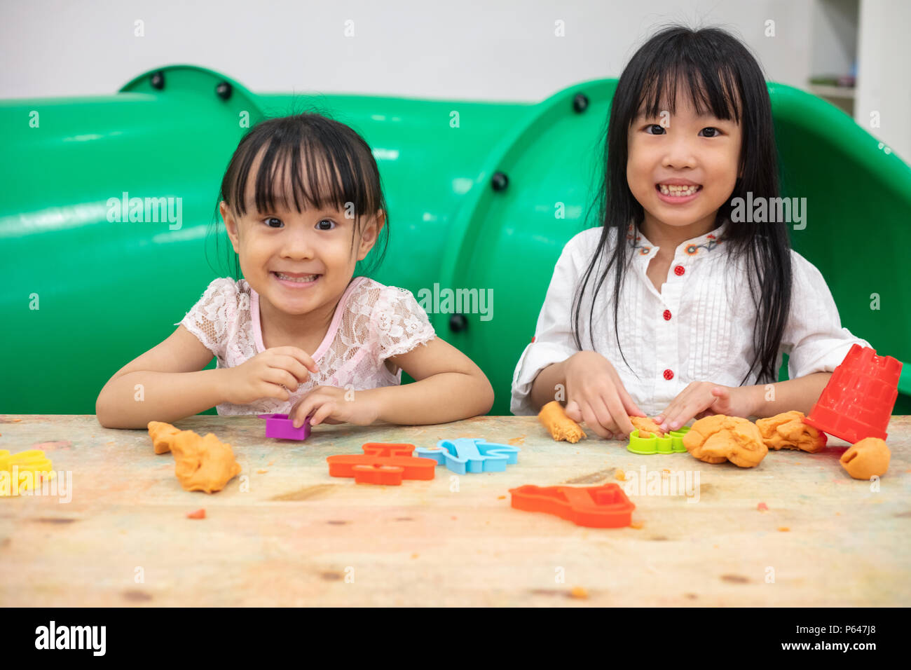 Asian Little Chinese Girls Playing Colorful Clay in Indoor Playground ...