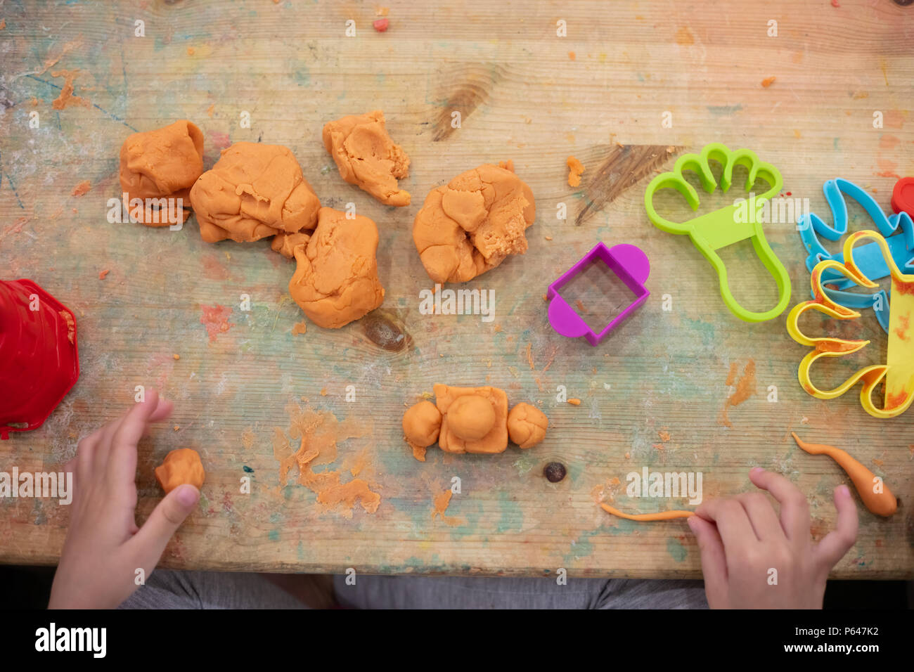 Children's hands Playing Colorful Clay in Indoor Playground Stock Photo ...