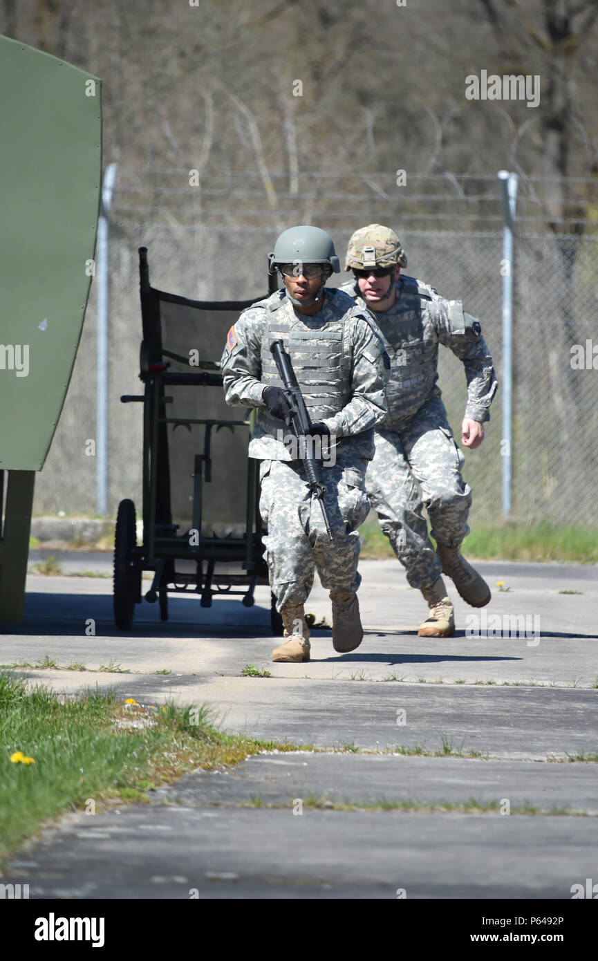 A U.S. Army Chaplain and a U.S. Army Chaplain Assistant (foreground ...