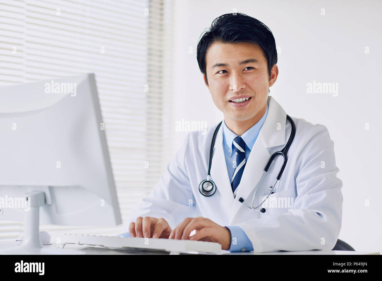 Japanese doctor in his studio Stock Photo - Alamy
