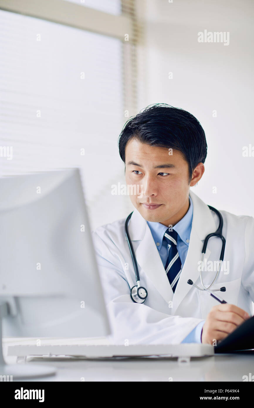 Japanese doctor in his studio Stock Photo - Alamy