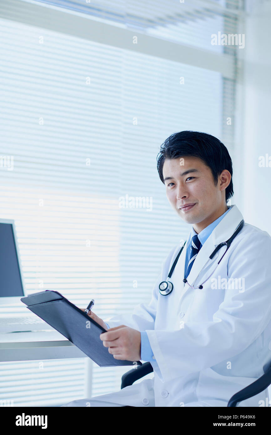 Japanese doctor in his studio Stock Photo - Alamy