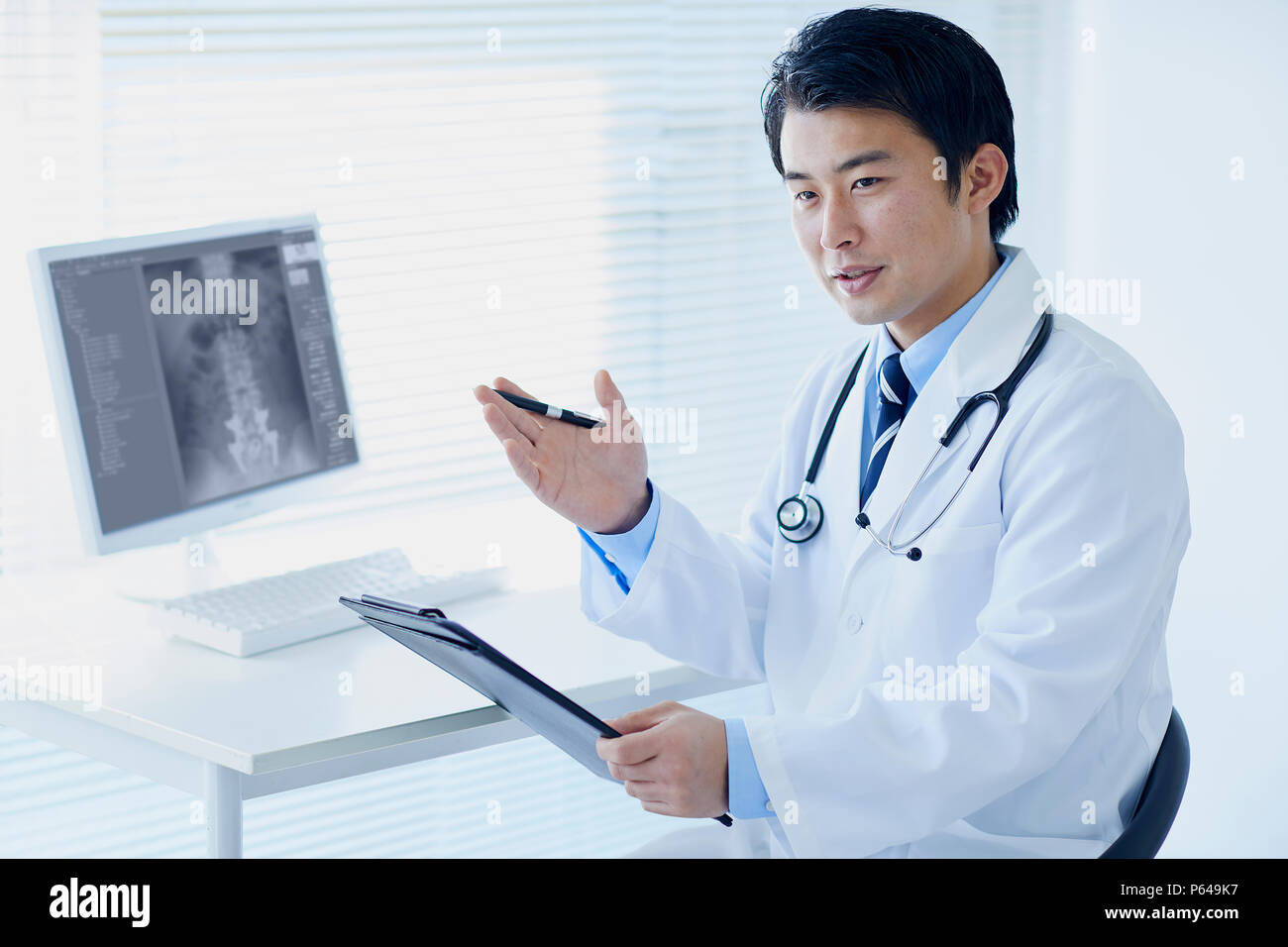 Japanese doctor in his studio Stock Photo - Alamy