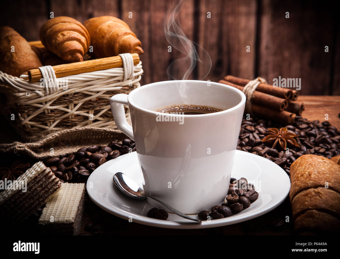 Coffee still life with cup of coffee with wood background Stock Photo ...
