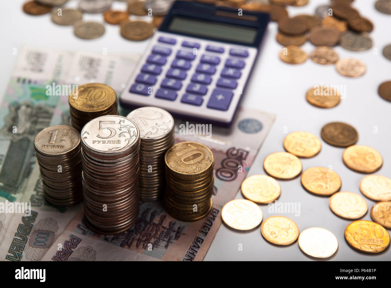 stacks of Russian rubles with calculator close up Stock Photo - Alamy