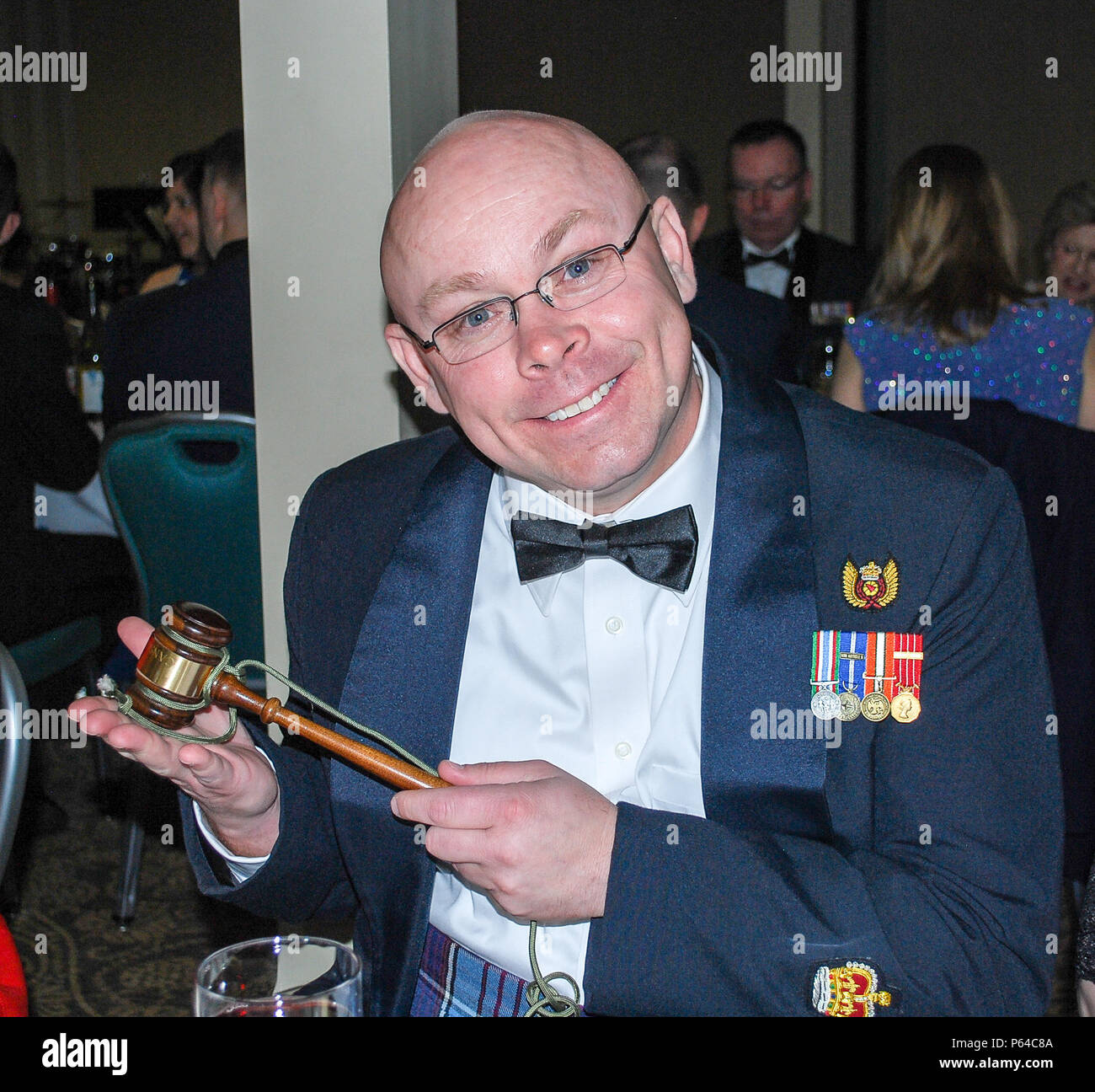Canadian Warrant Officer Richard Martin takes a moment to show off his ...