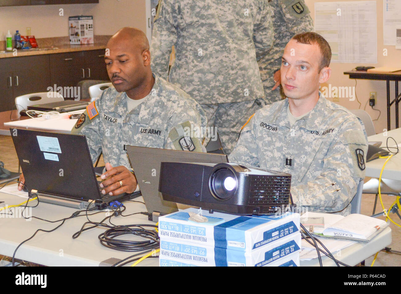 U.S. Army Capt. Nathanel Taylor and Capt. Robert Goodwin, 228th Signal ...