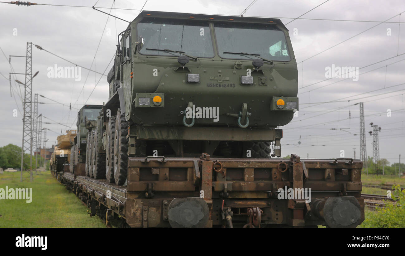 Locally-sourced Bulgarian contractors prepare to offload a Logistics ...