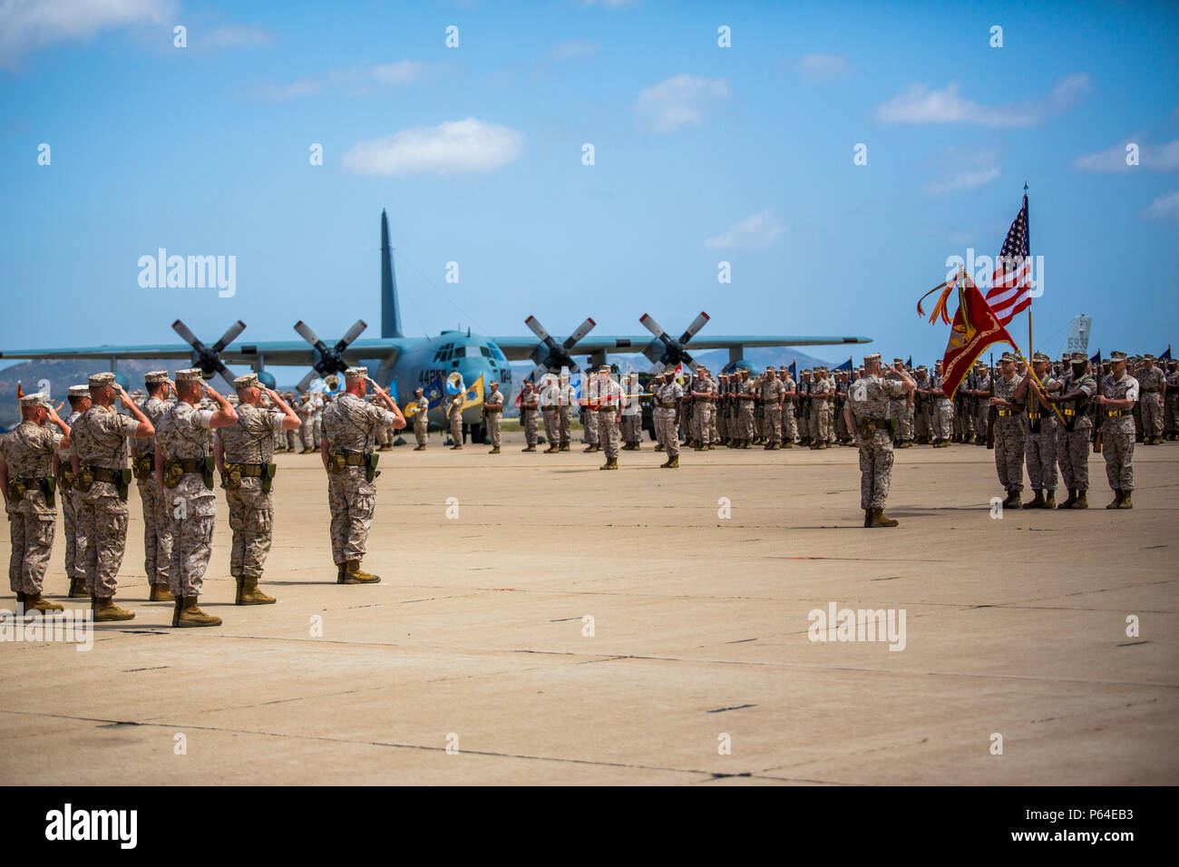 The 4th Marine Aircraft Wing color guard team march on the colors at a ...