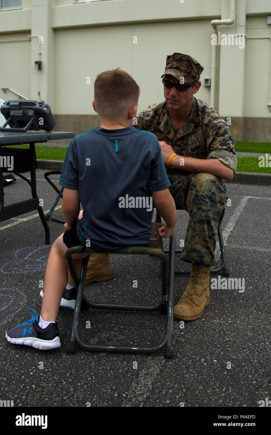 Sgt. Larry K. Hicks Jr. explains his career responsibilities to a ...