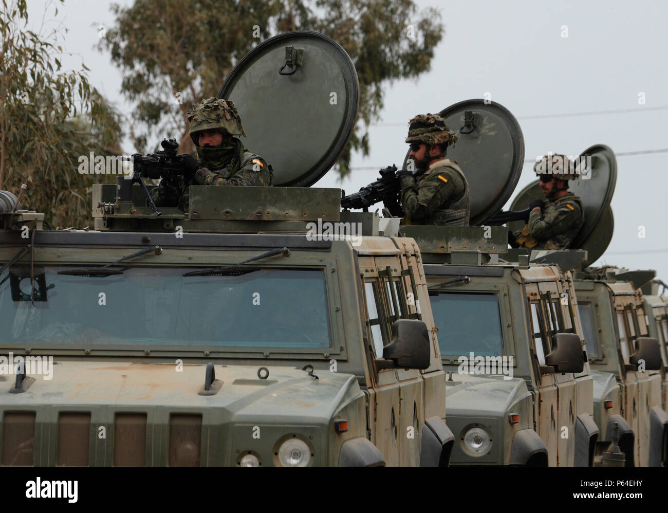 Spanish Legion soldiers provide security from humvee’s during a ...