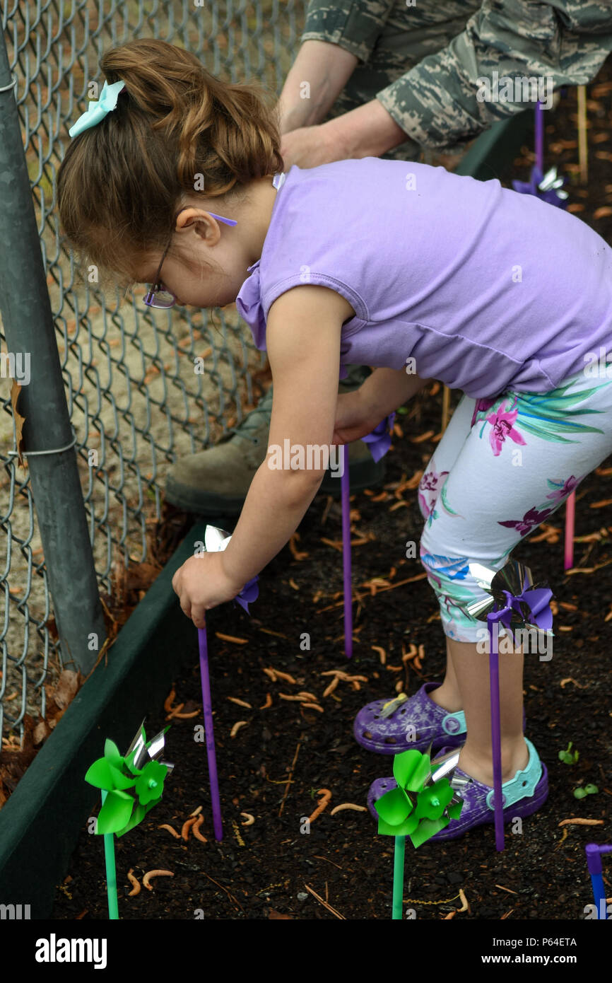 Children with pinwheels back hi-res stock photography and images - Alamy