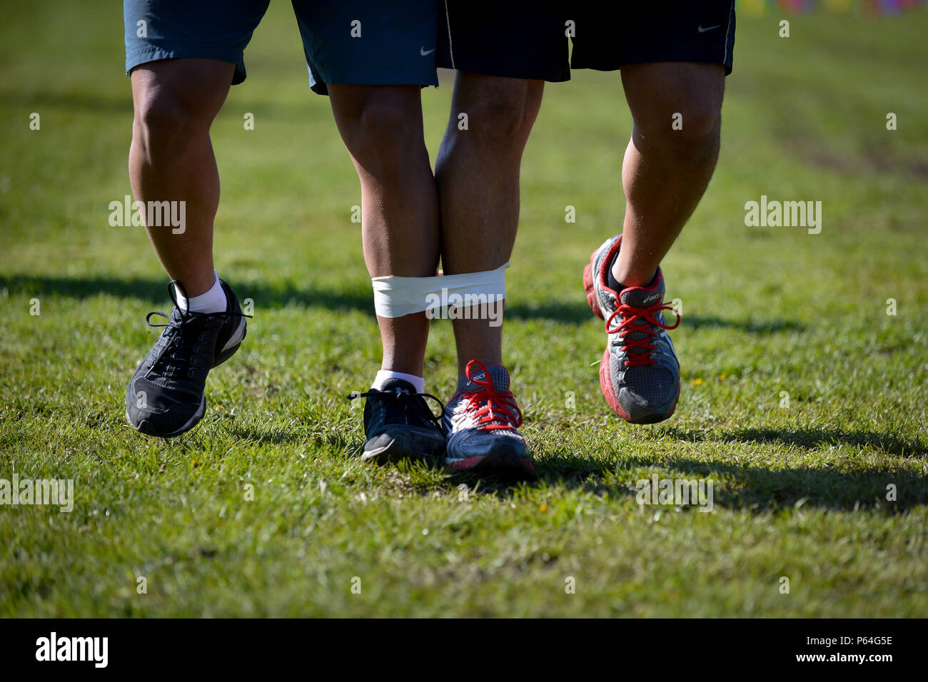 A Three Legged Race High Resolution Stock Photography and Images - Alamy A Three Legged Race High Resolution Stock Photography and Images - Alamy
