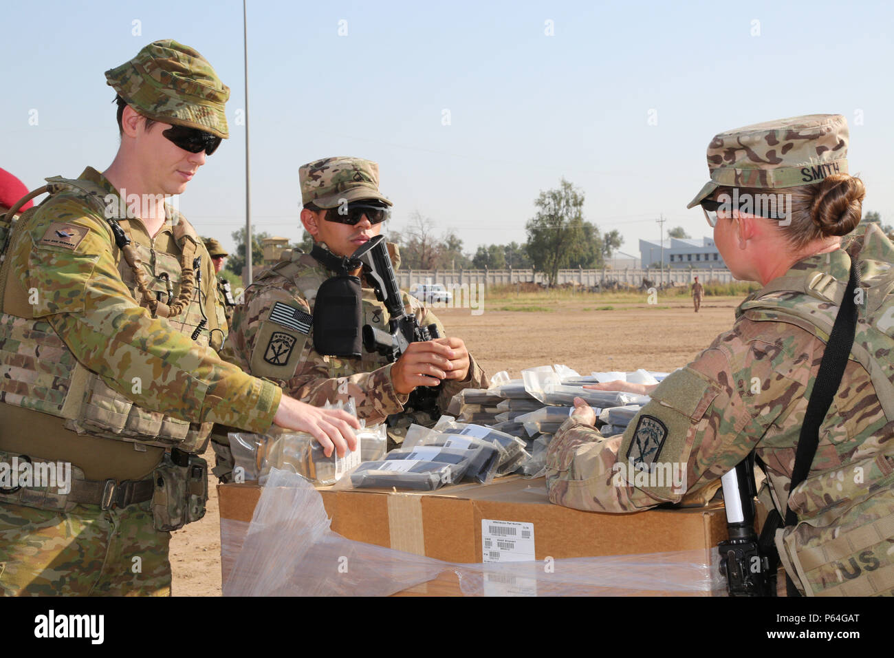 An Australian soldier with Task Group Taji, along with U.S. Soldiers ...