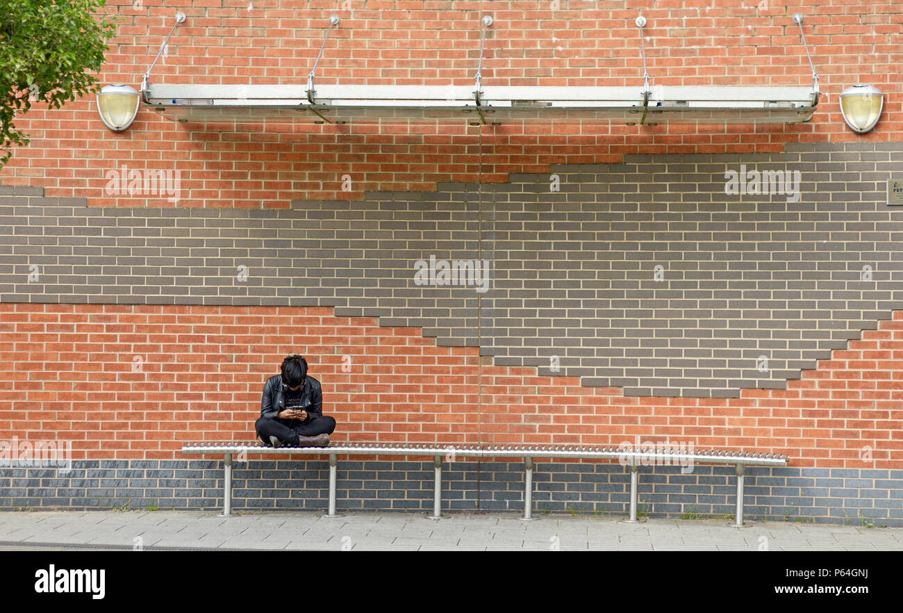 Guy sitting bench hi-res stock photography and images - Alamy