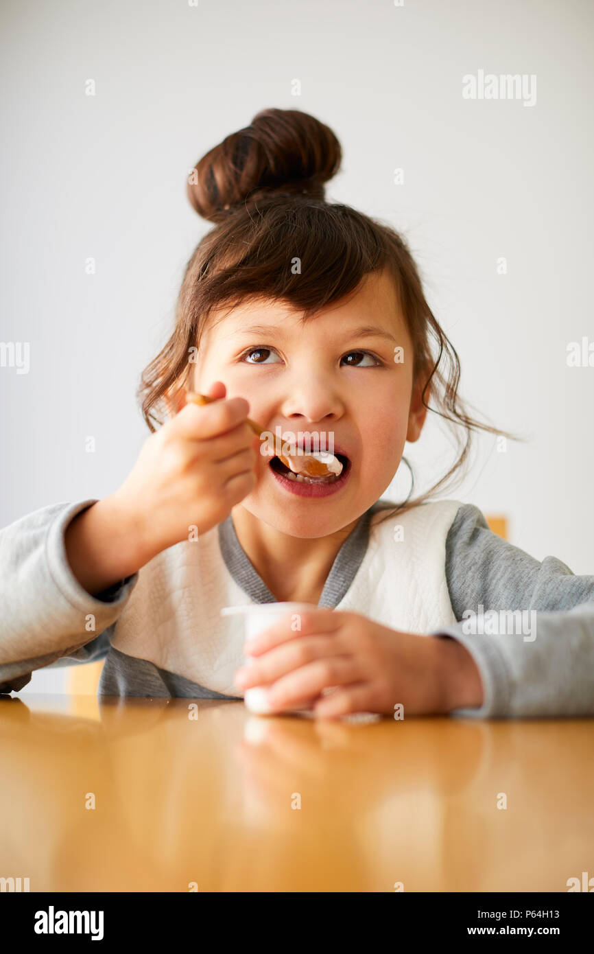 Cute Japanese kid having a snack Stock Photo - Alamy