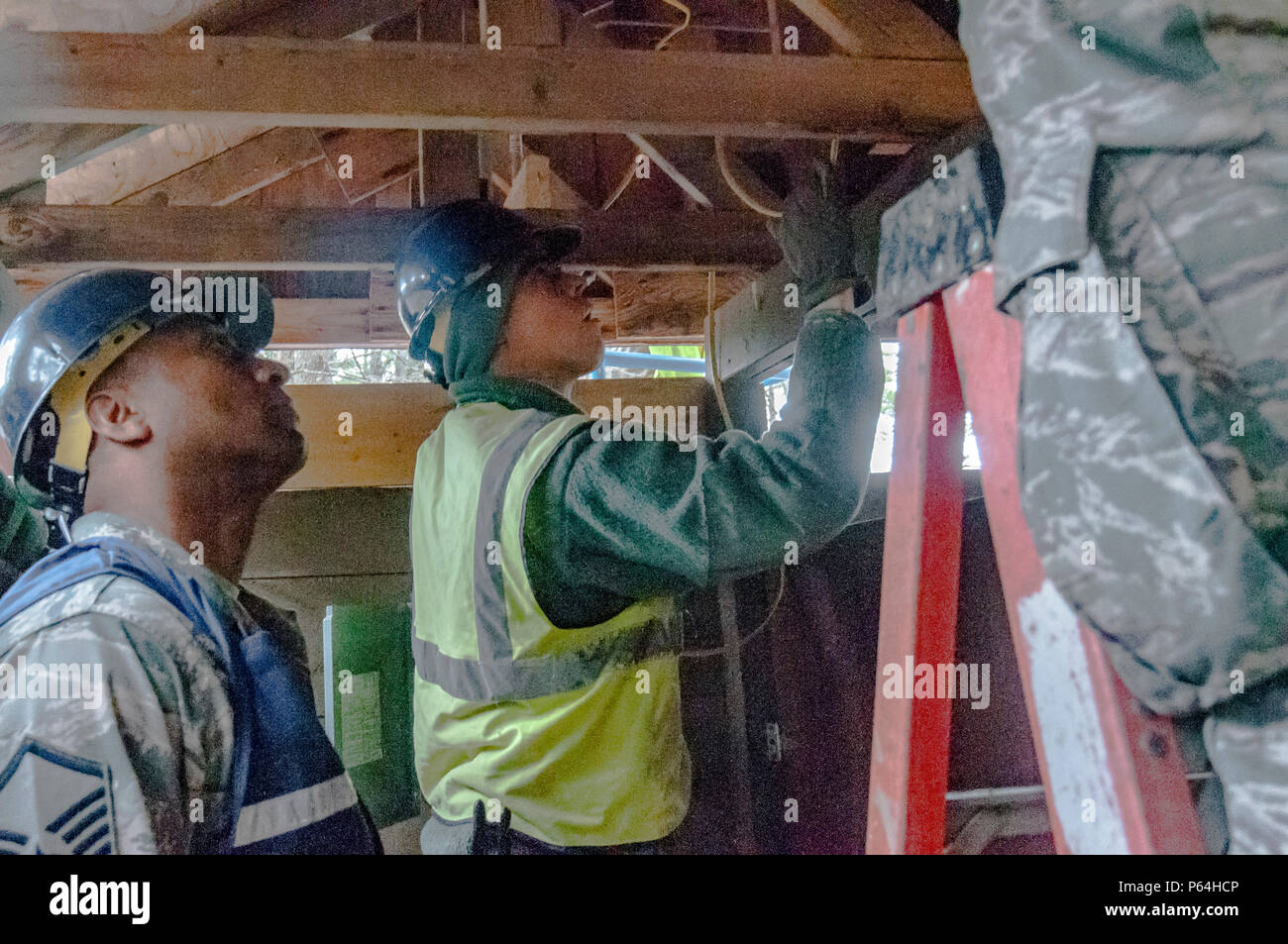 Master Sgt. Luke Wimby, the acting first sergeant watches Staff Sgt ...