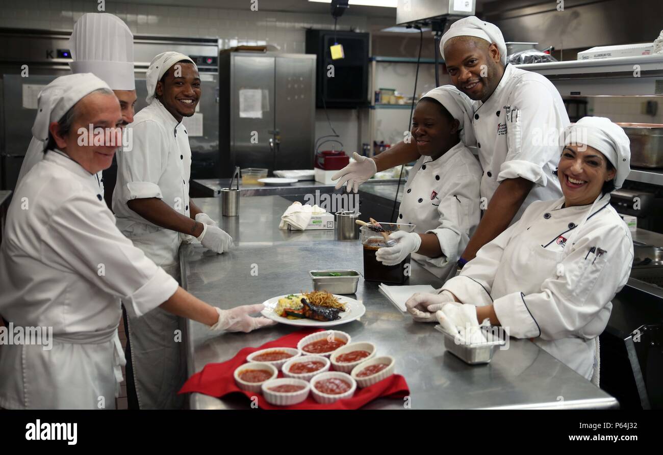 Chefs from Chef’s Palette restaurant pose for a photo with the meal ...