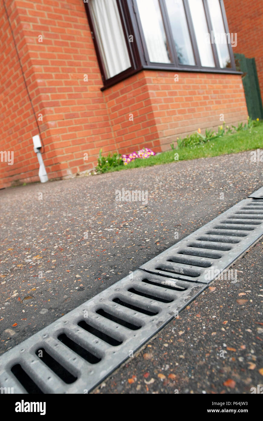 Rain water overflow Stock Photo - Alamy