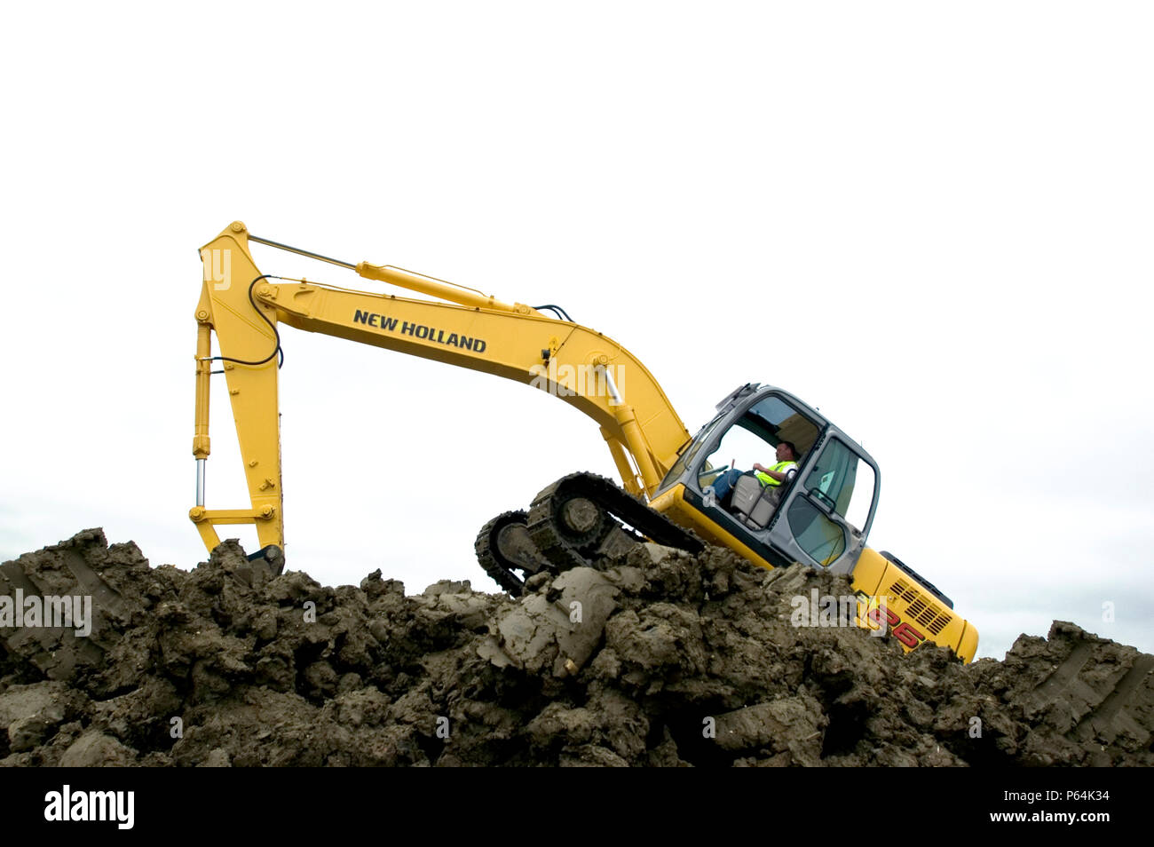 Excavator in action Stock Photo - Alamy