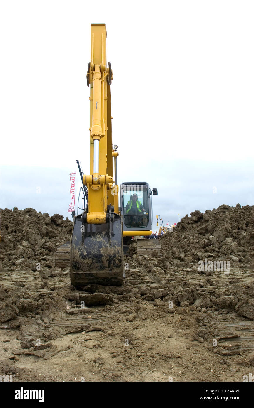 Excavator in action Stock Photo - Alamy