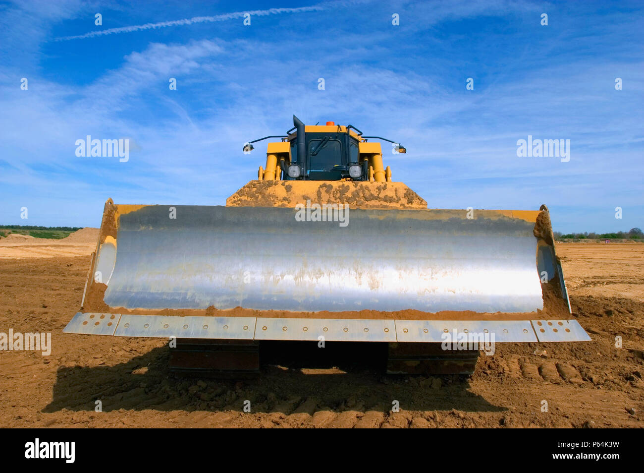 Front view of an Earthmover on brownfield Stock Photo - Alamy