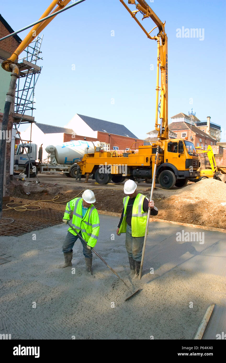 Pouring concrete on foundations Stock Photo - Alamy
