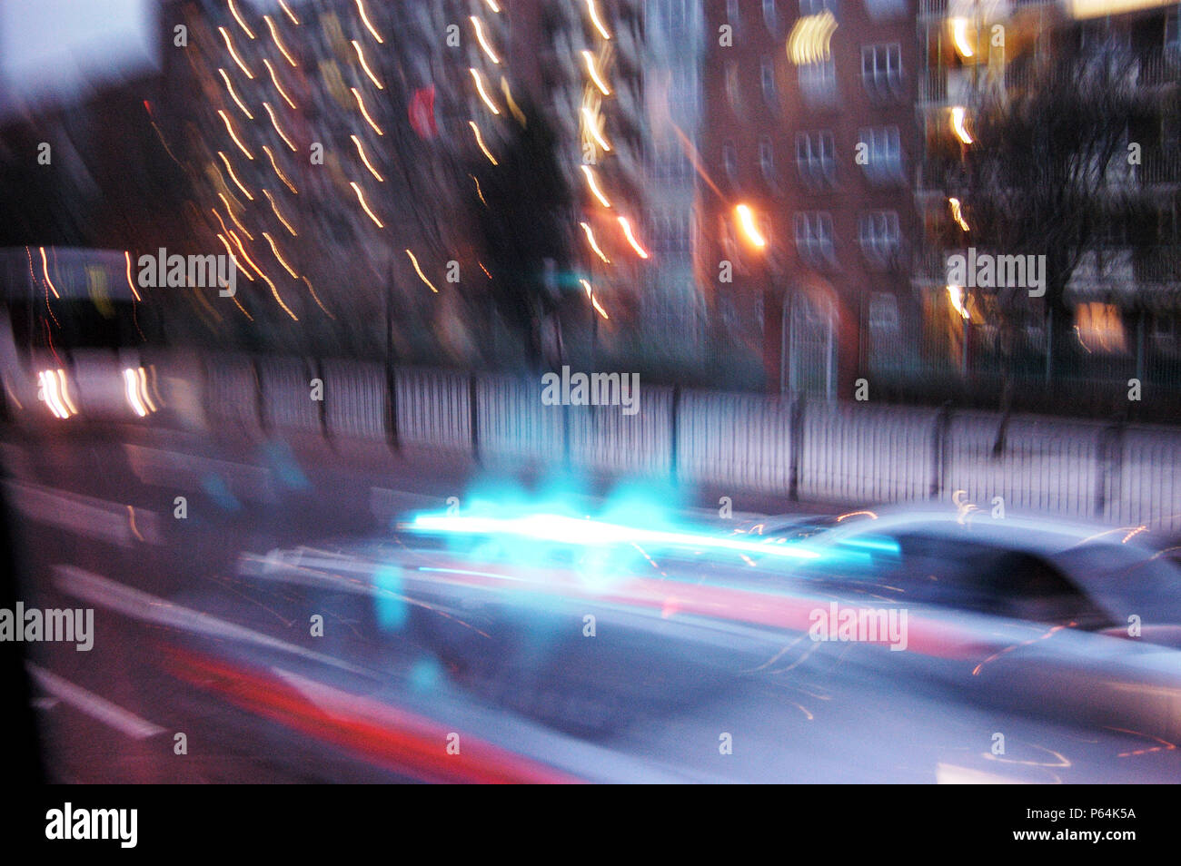 Police car rushing past in the city of London Stock Photo - Alamy