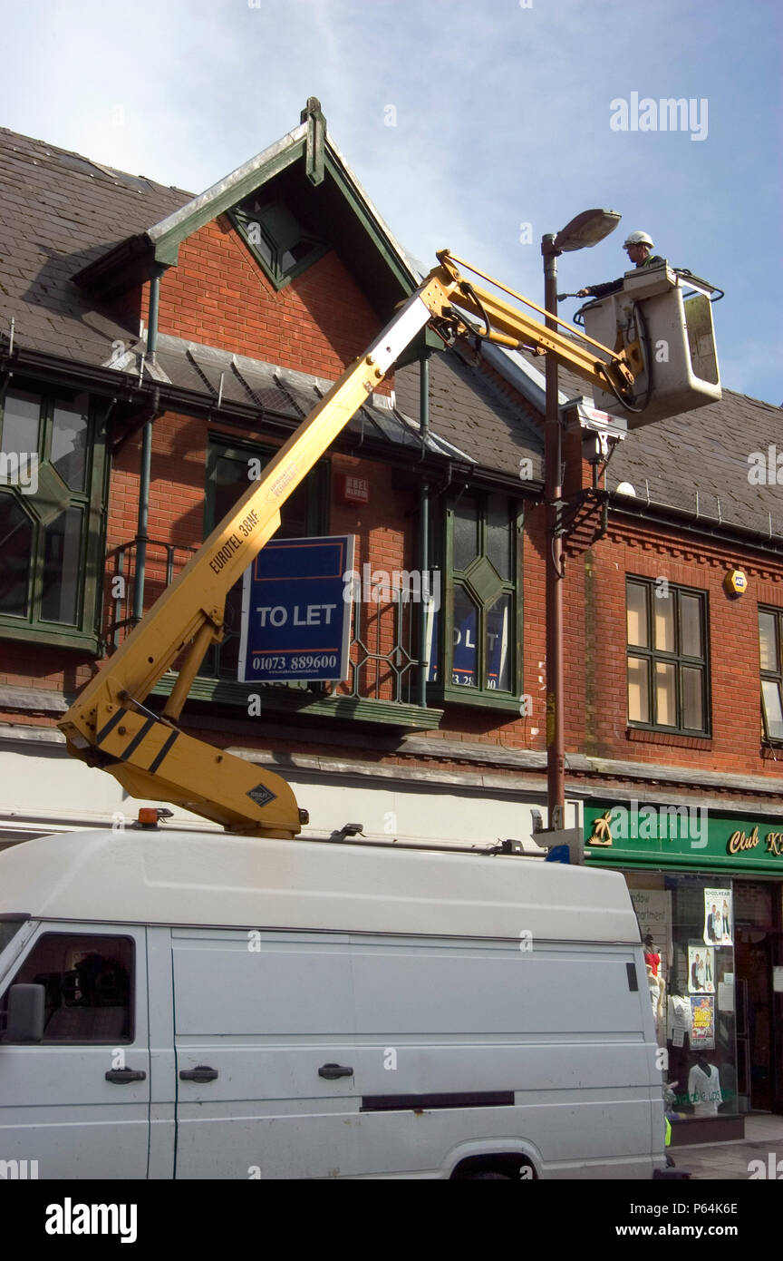 Repairing street lights Stock Photo - Alamy
