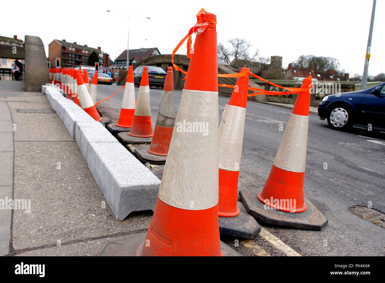 Red cones on the pavement Stock Photo - Alamy