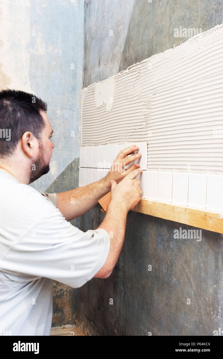 Tiling in progress Stock Photo - Alamy
