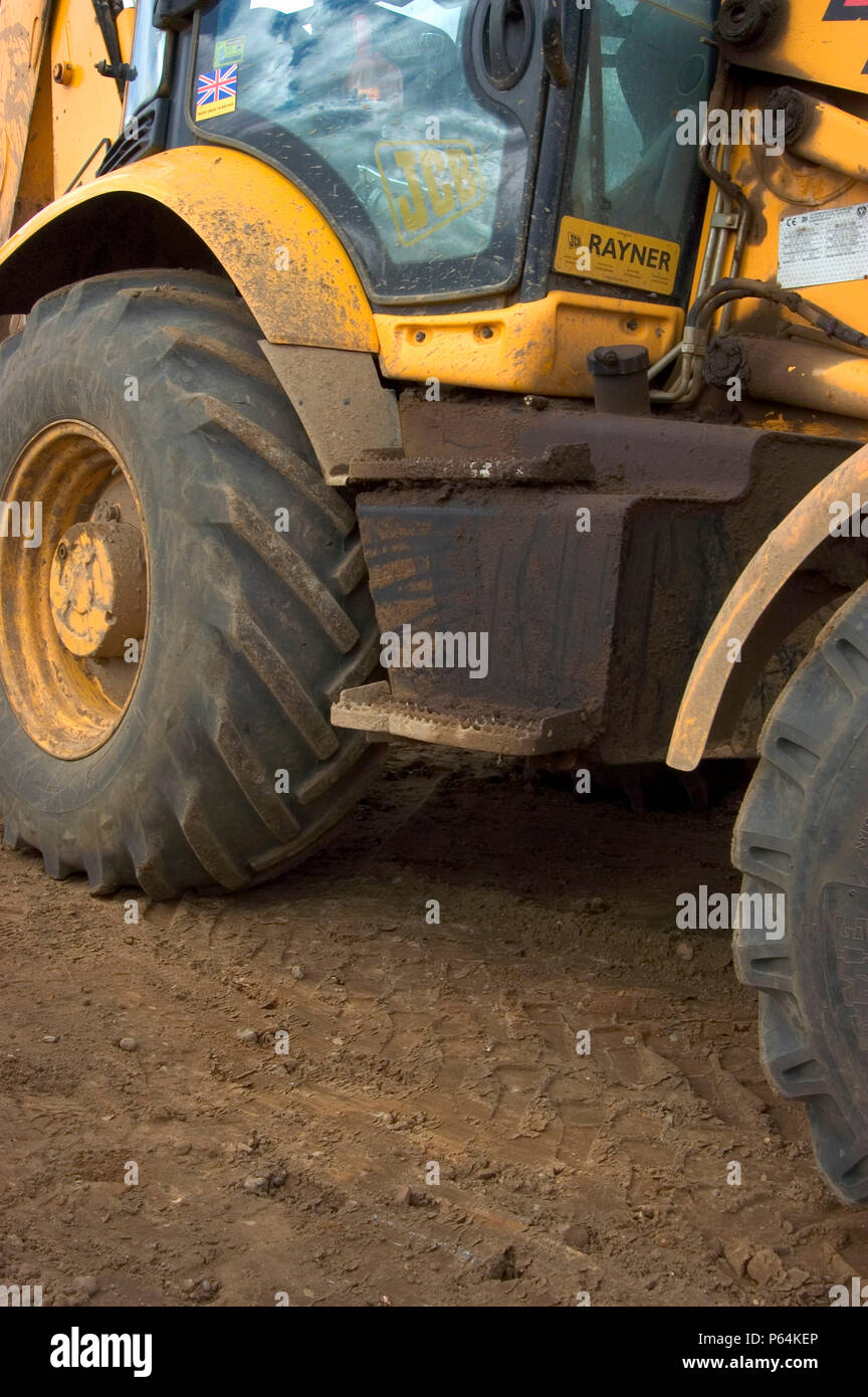 Steps on the side of a JCB excavator Stock Photo - Alamy