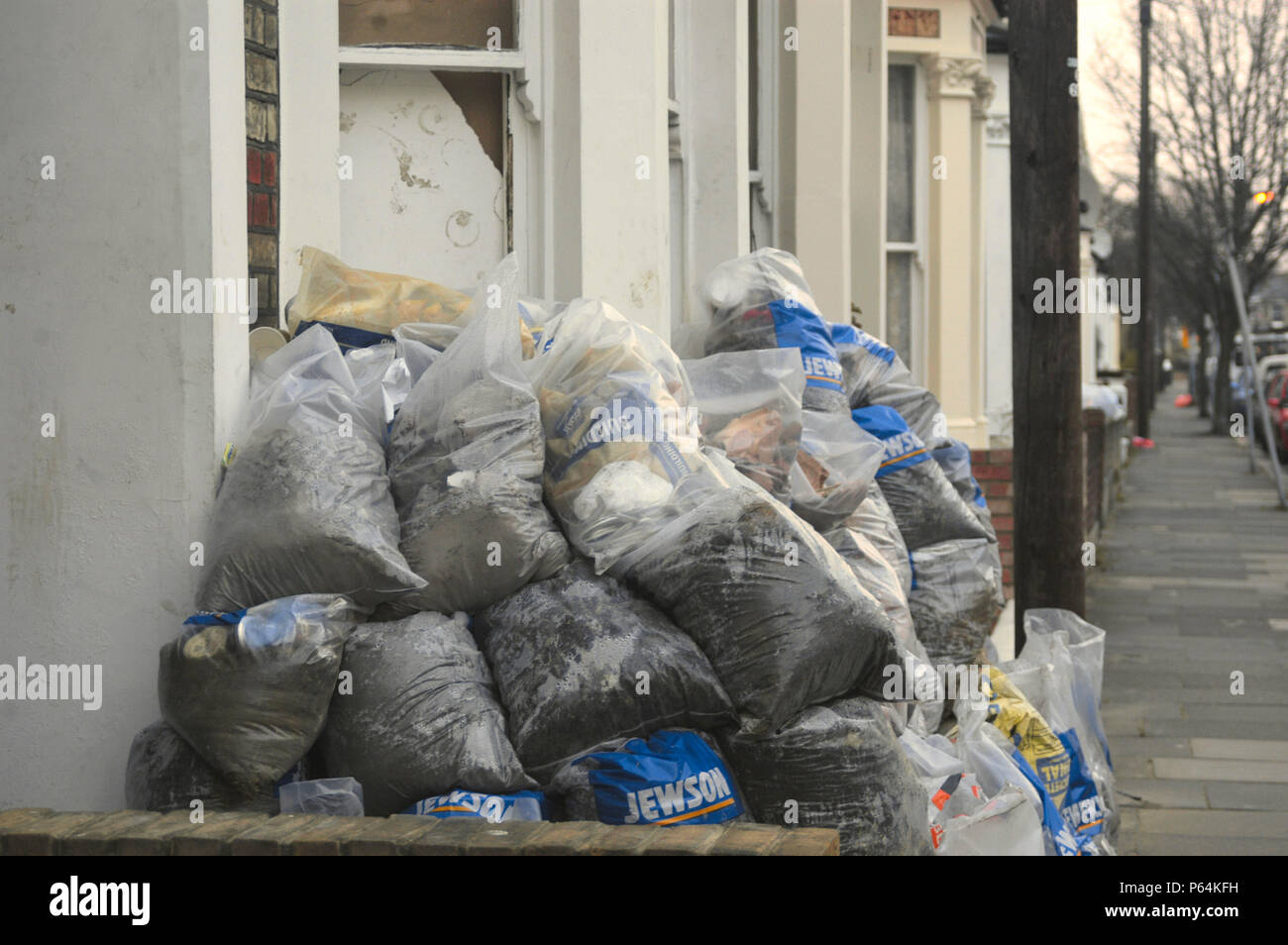Construction waste in the streets of London, UK Stock Photo - Alamy