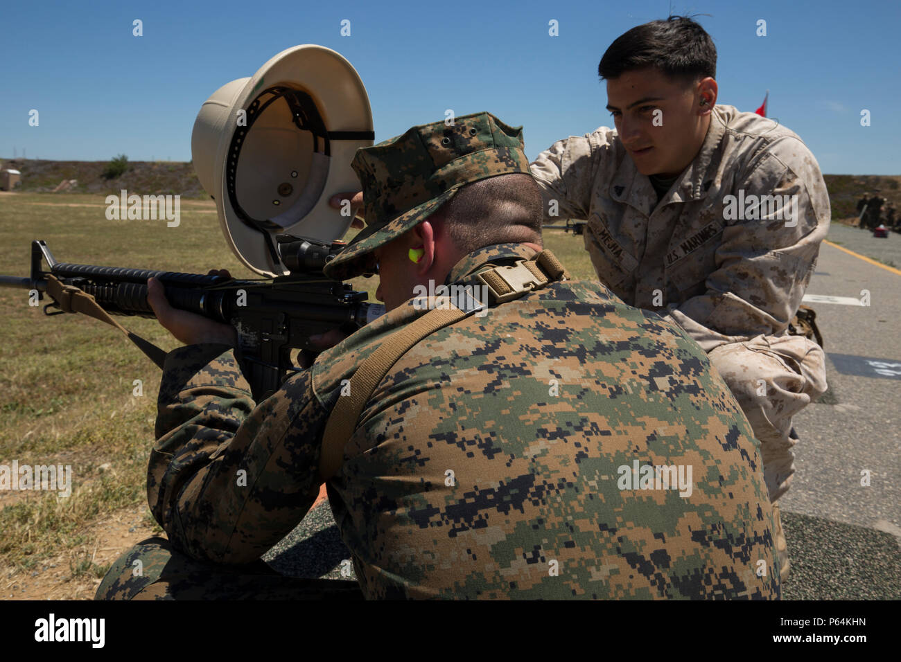 U.S. Marine Corps Cpl. Eduardo R. Mejia, a range coach with Delta Range ...