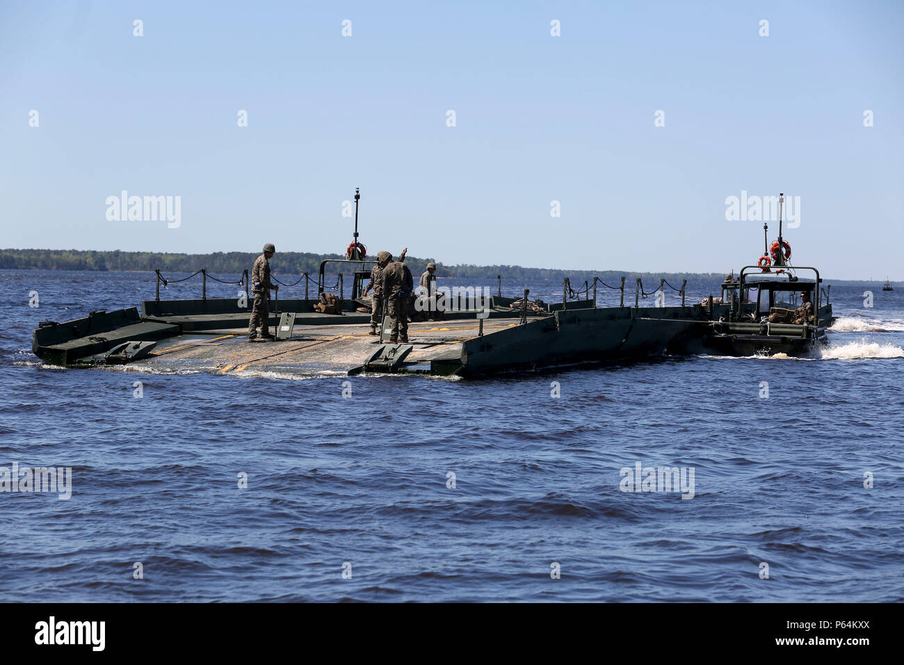 An Improved Ribbon Bridge makes its way across the water while ...