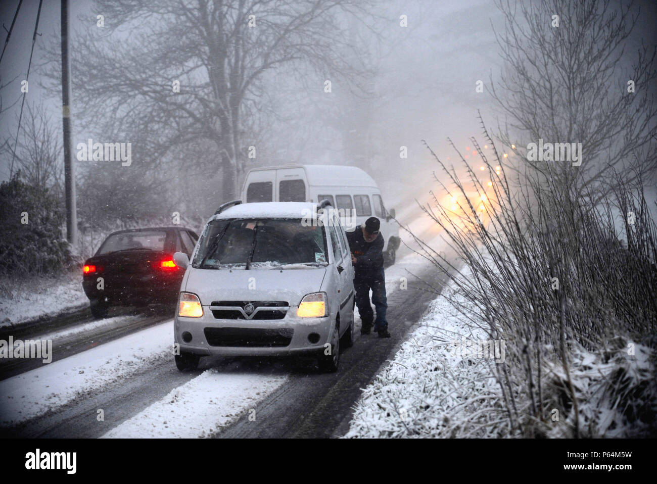 Pushing stuck vehicle hi-res stock photography and images - Alamy