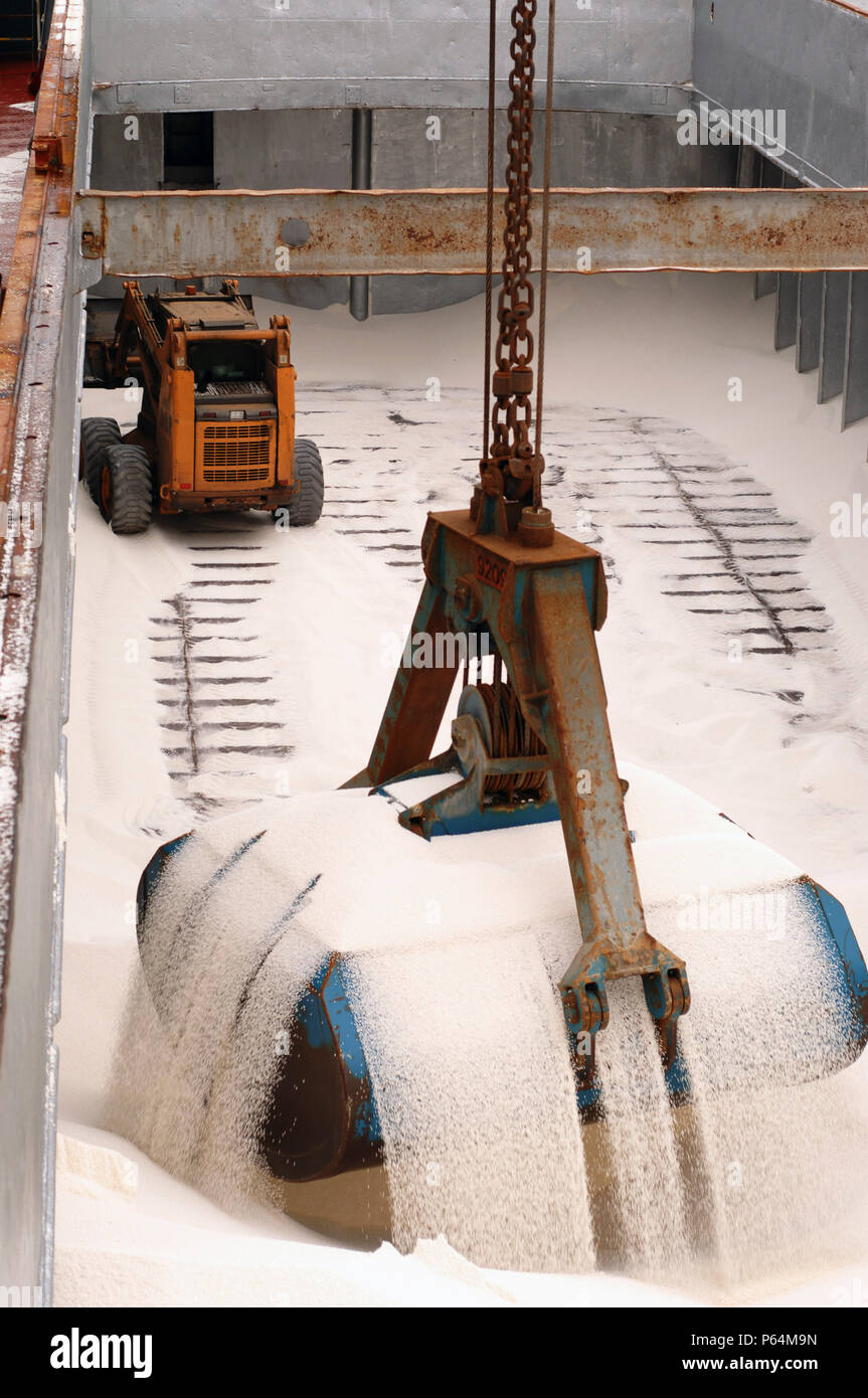Unloading fertilizer by crane on the dockside at a port in Newport ...