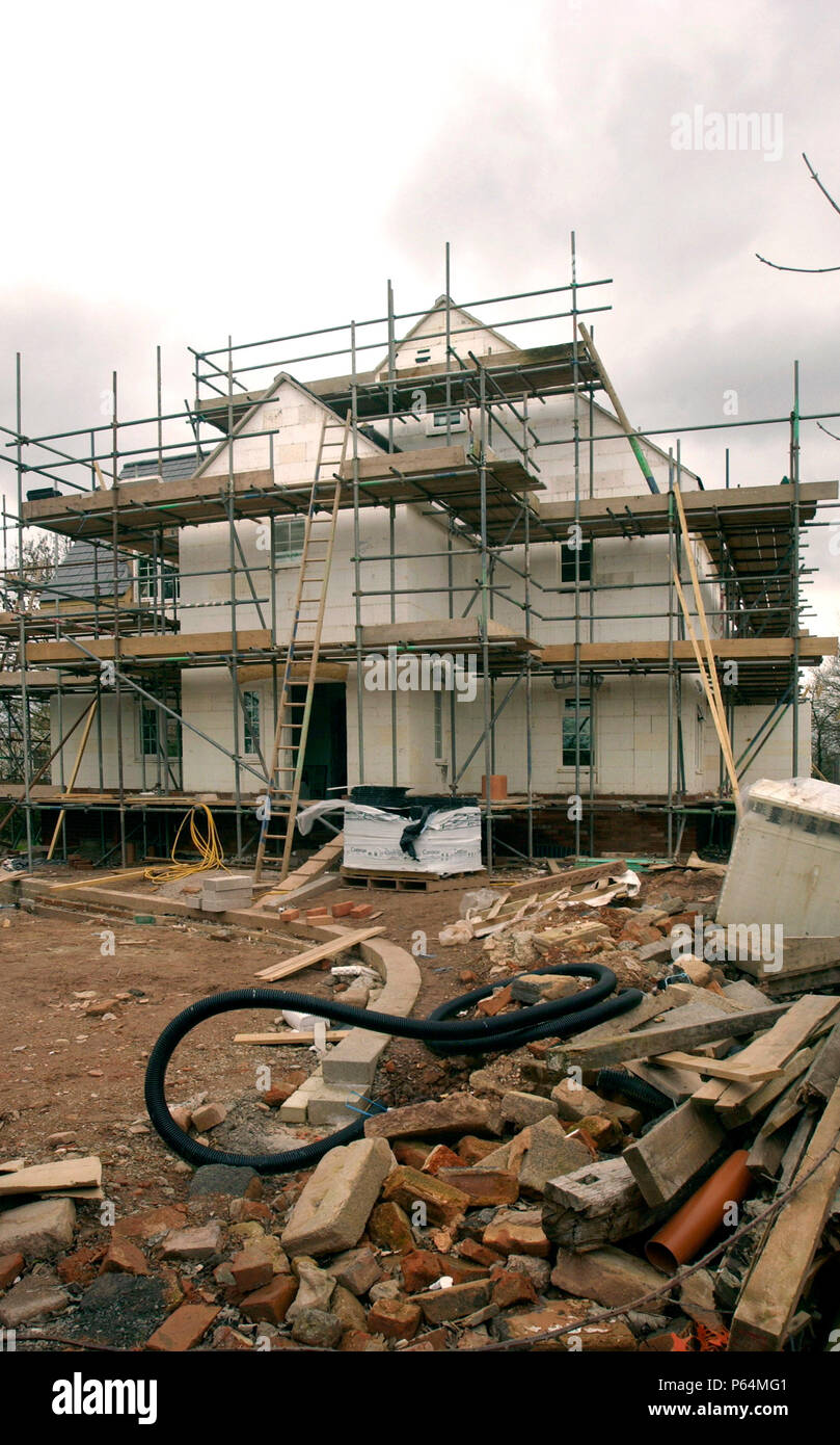 Self build house surrounded by scaffolding Stock Photo - Alamy