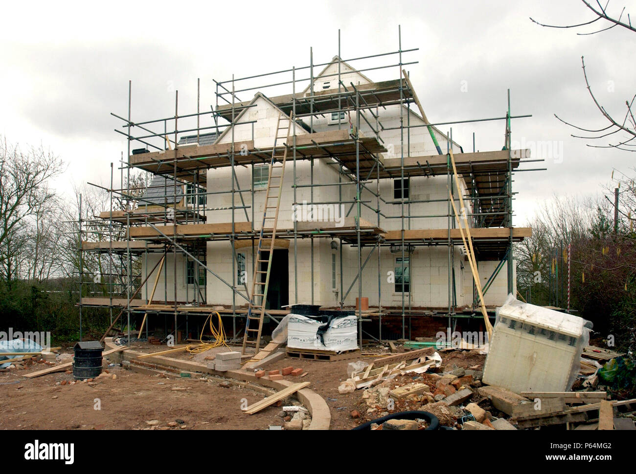 Self build house surrounded by scaffolding Stock Photo - Alamy