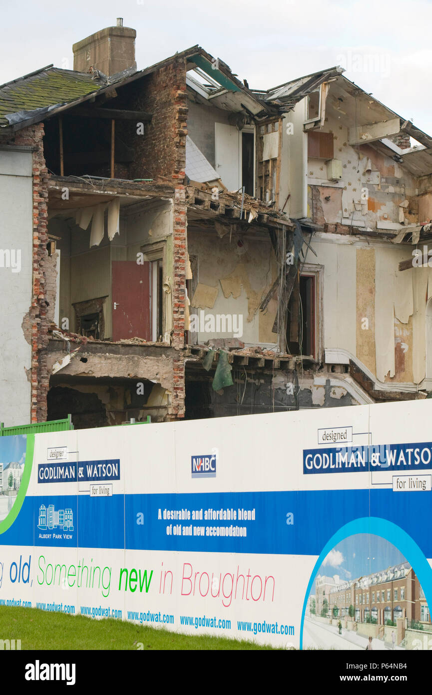 Demolishing derelict houses in Manchester UK Stock Photo - Alamy