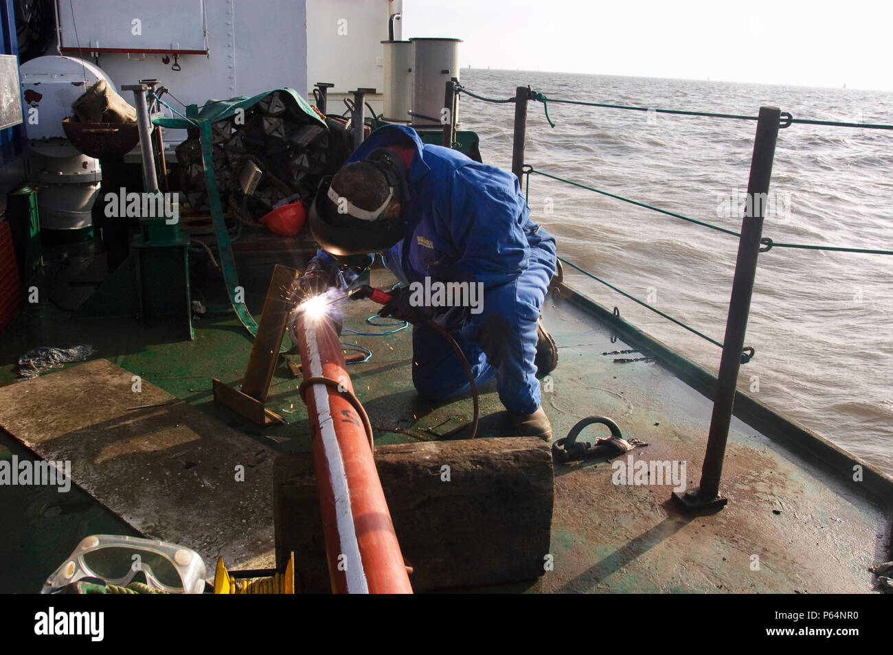 welding onboard cabling barge 'The Wind' Laying Cables for Windfarm on ...