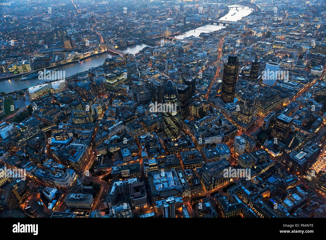 Aerial view of City of London over River Thames at night, London Stock ...