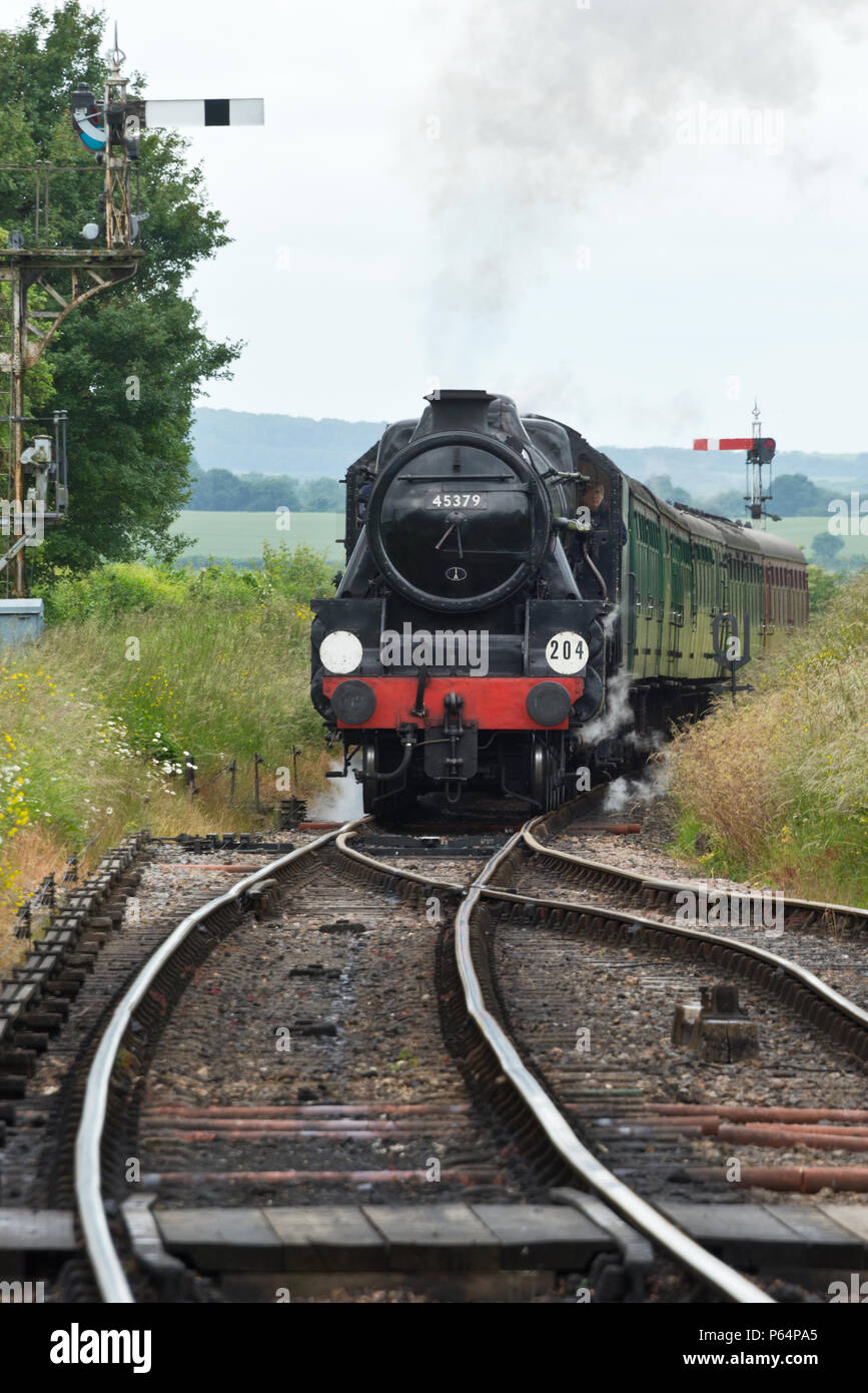 Steam locomotive 45379 in full steam arriving at Ropley Station during ...