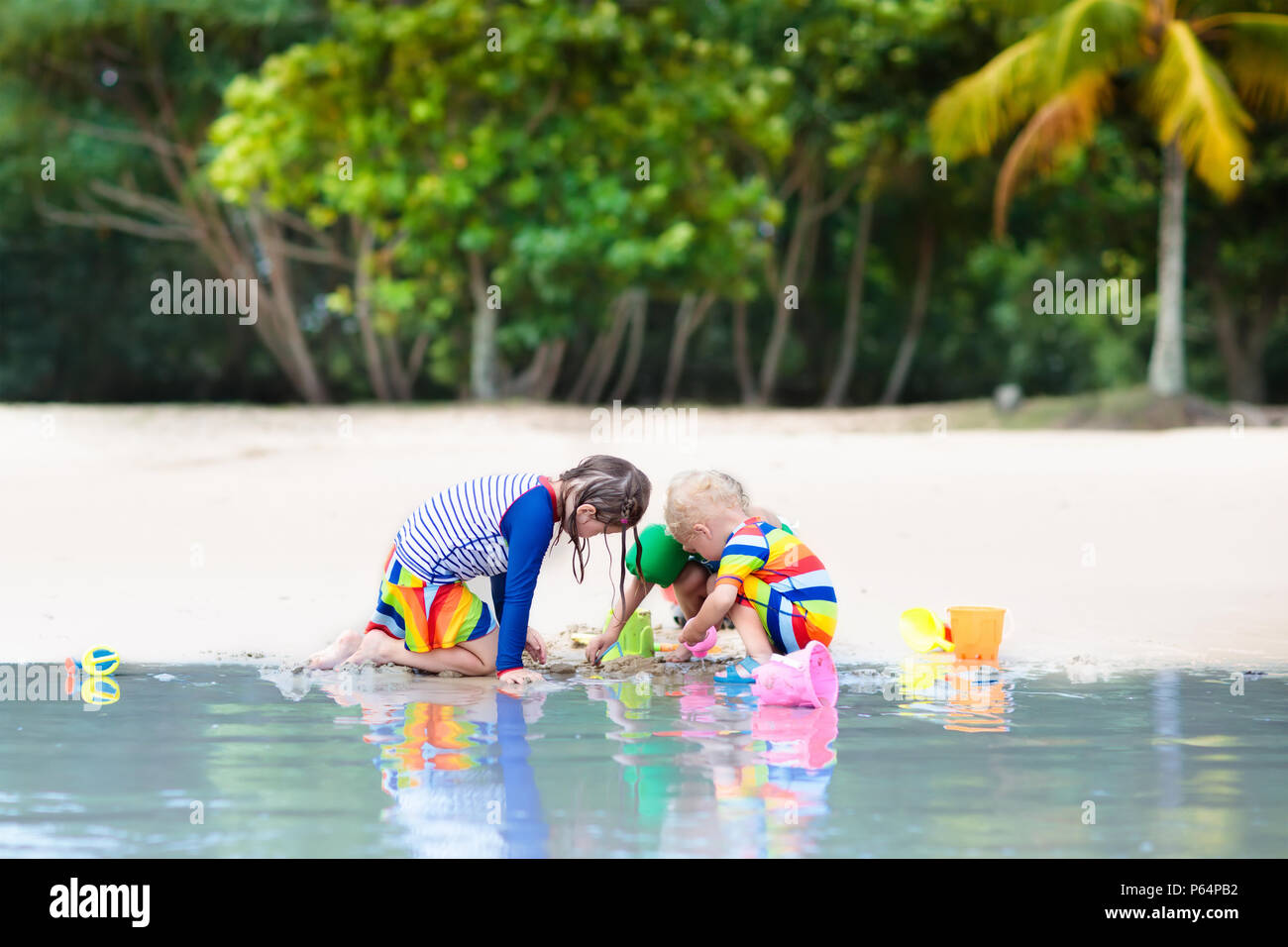 Boy digging sand hi-res stock photography and images - Alamy