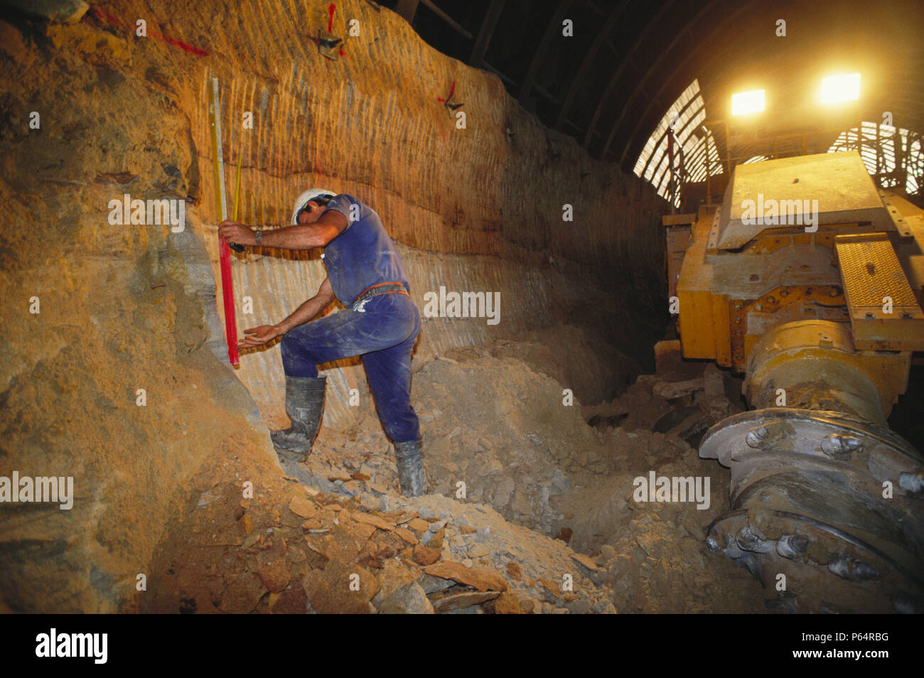 Taking measurements after tunnel excavation by road header excavation ...