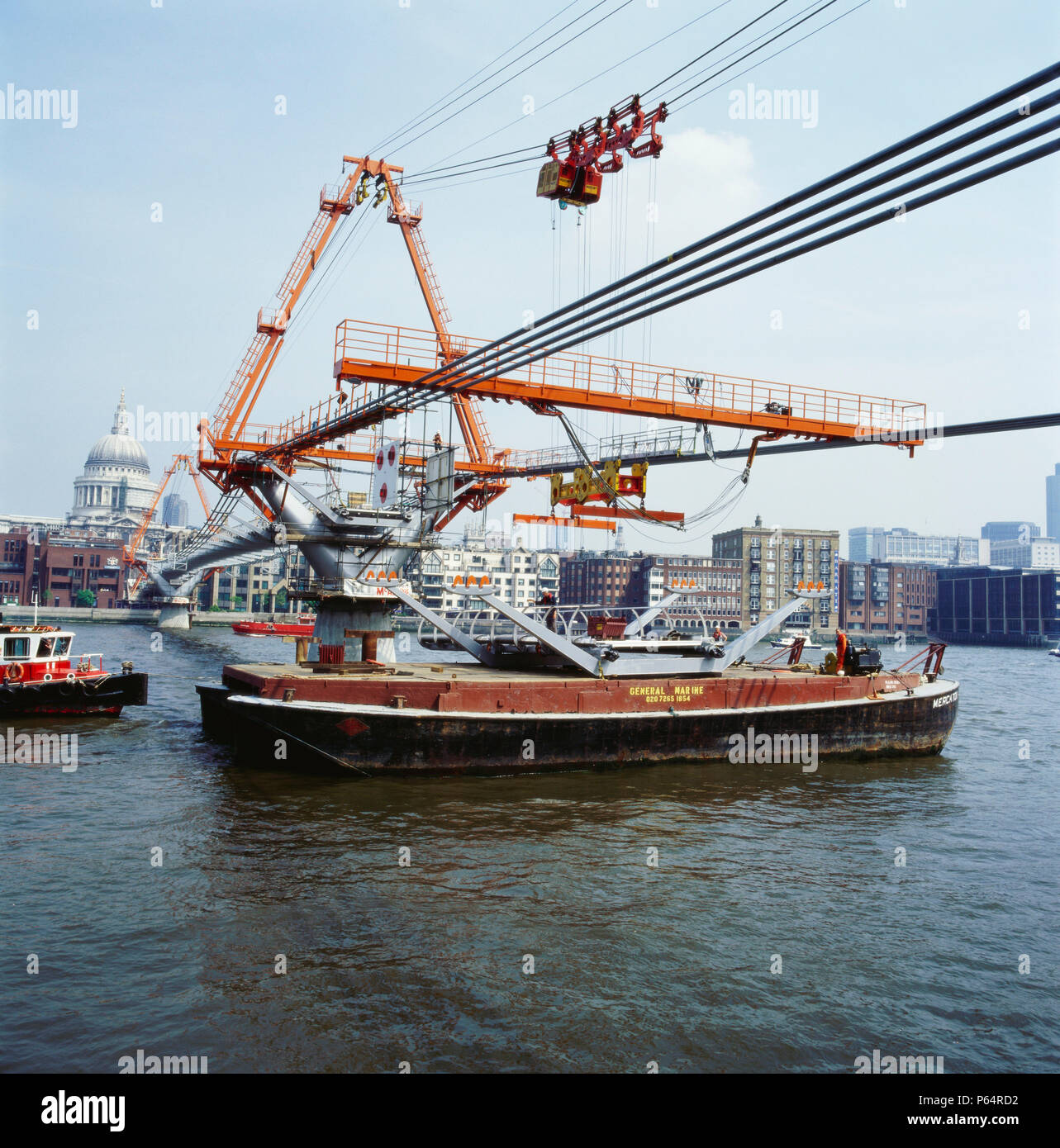 River barge delivering bridge sections during the construction of the ...