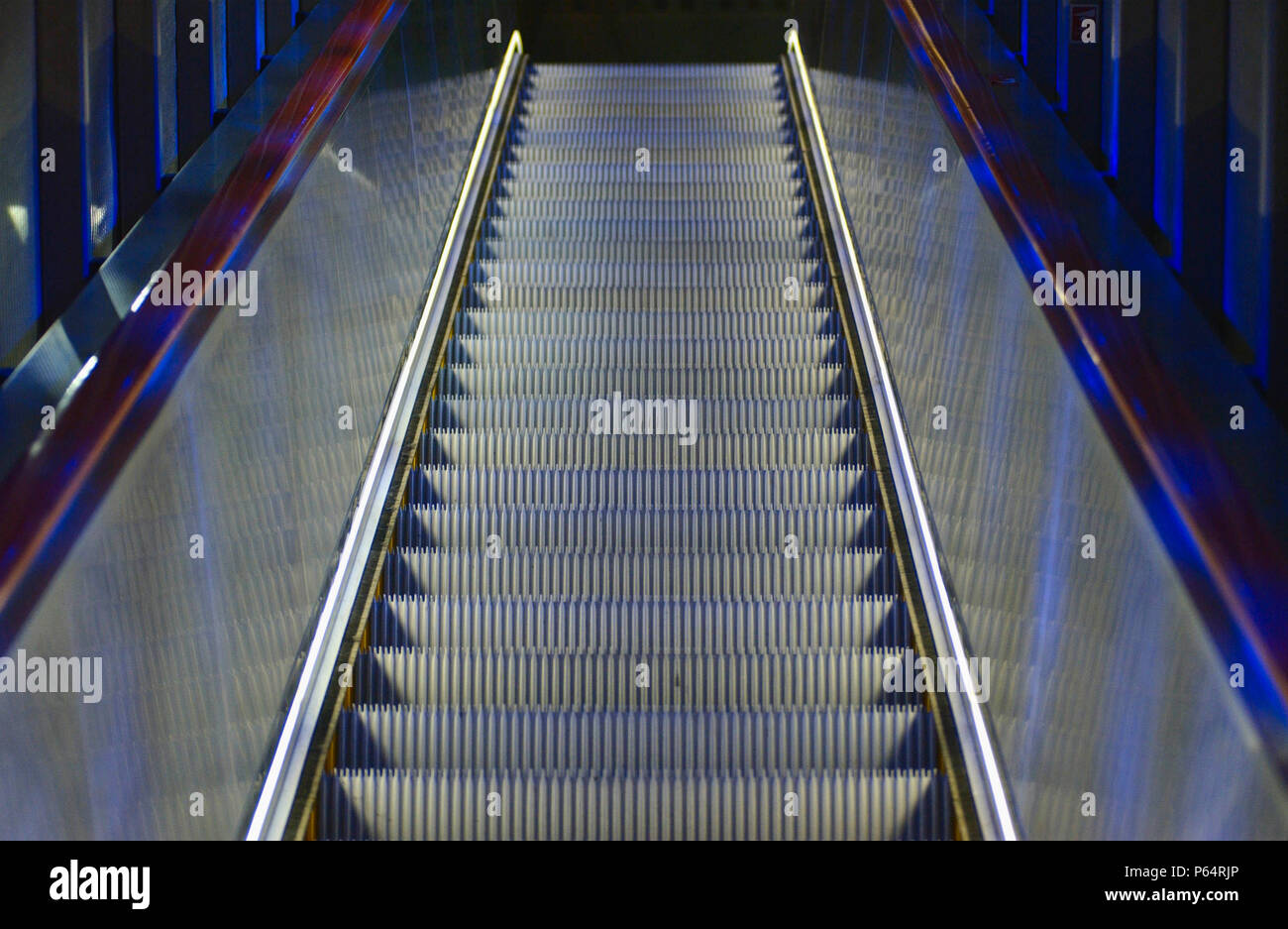 Escalator at Heron Quays DLR station, London, UK Stock Photo - Alamy