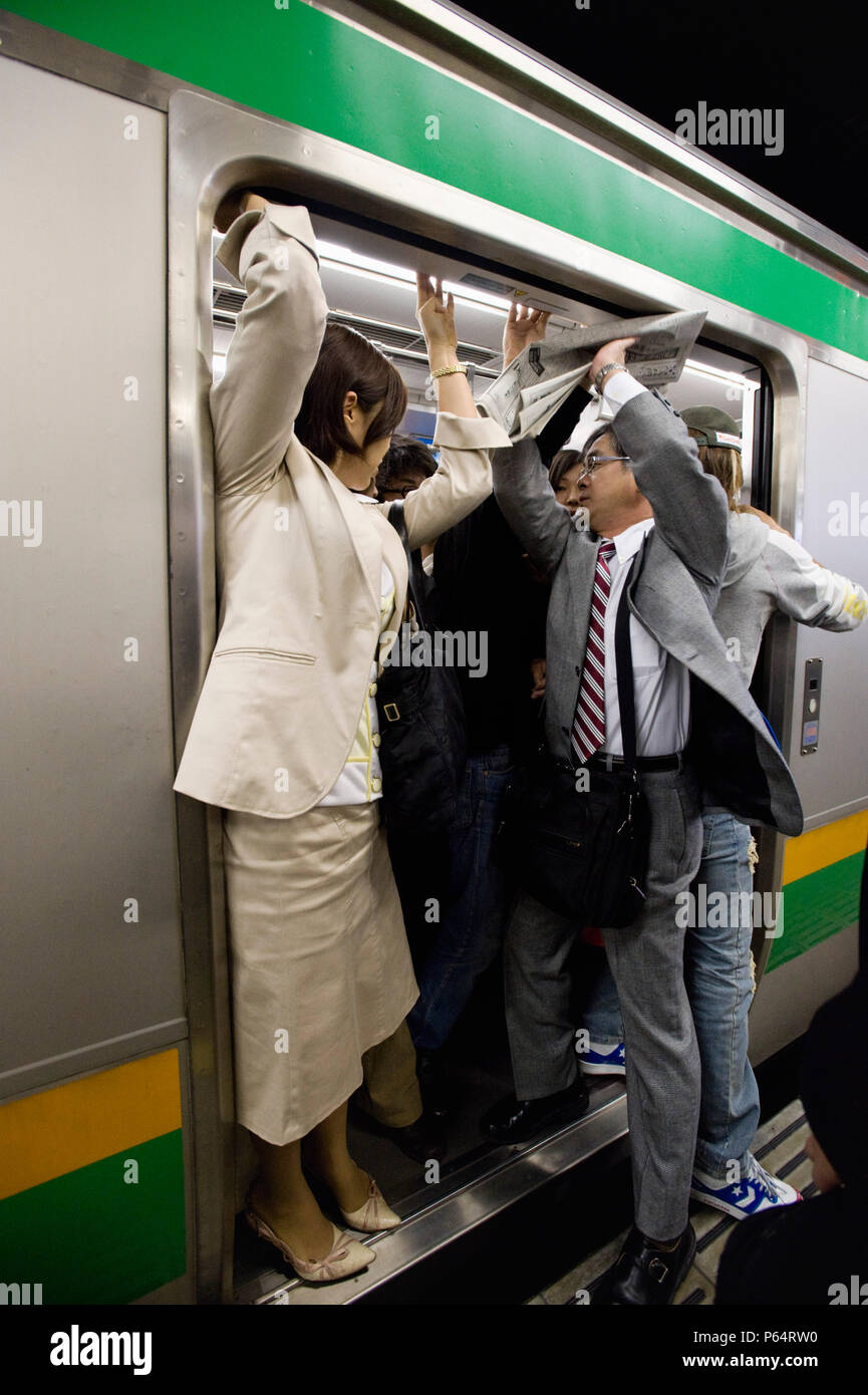 Overcrowded train japan hi-res stock photography and images - Alamy